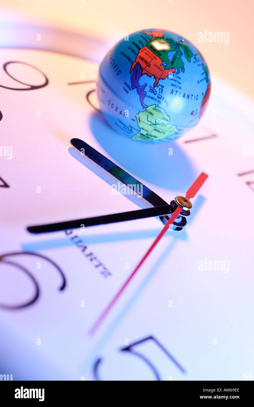 Globe and Clock Stock Photo - Alamy