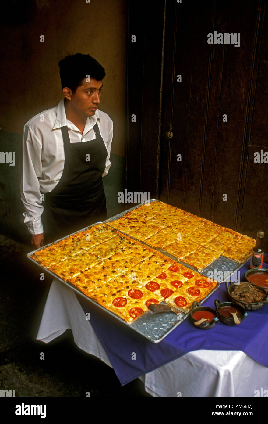 Mexican man, adult man, man, waiter, selling pizza, pizza for sale ...