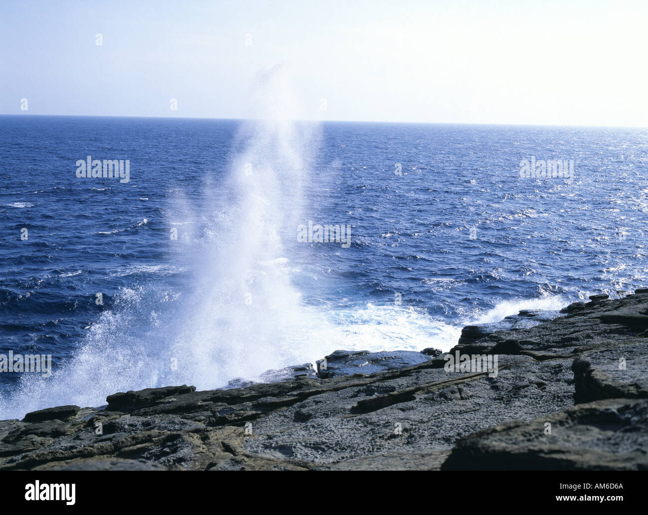 Wave splash Okinawa Japan Stock Photo - Alamy