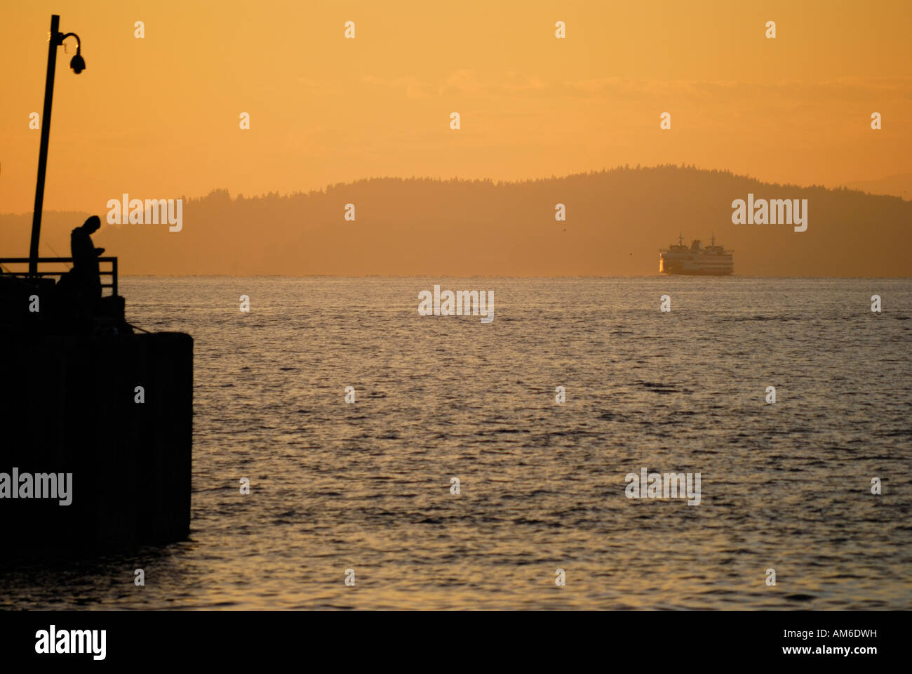 Fishing off Seattle's Pier 69 Stock Photo - Alamy