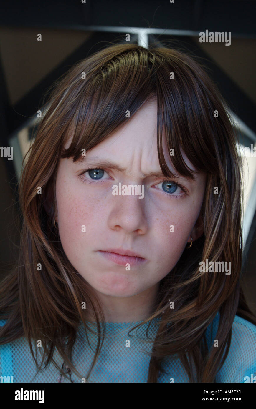 Frowning young girl Stock Photo - Alamy