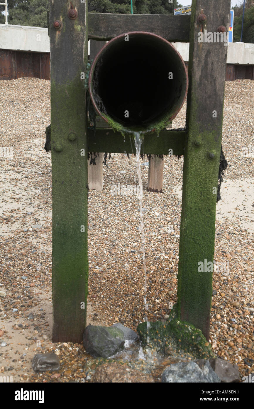 Drain outflow pipe emptying on beach Felixstowe, Suffolk, England Stock ...