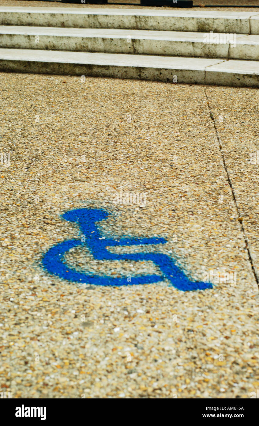 handicaped symbol painted on the floor near stairs Stock Photo - Alamy