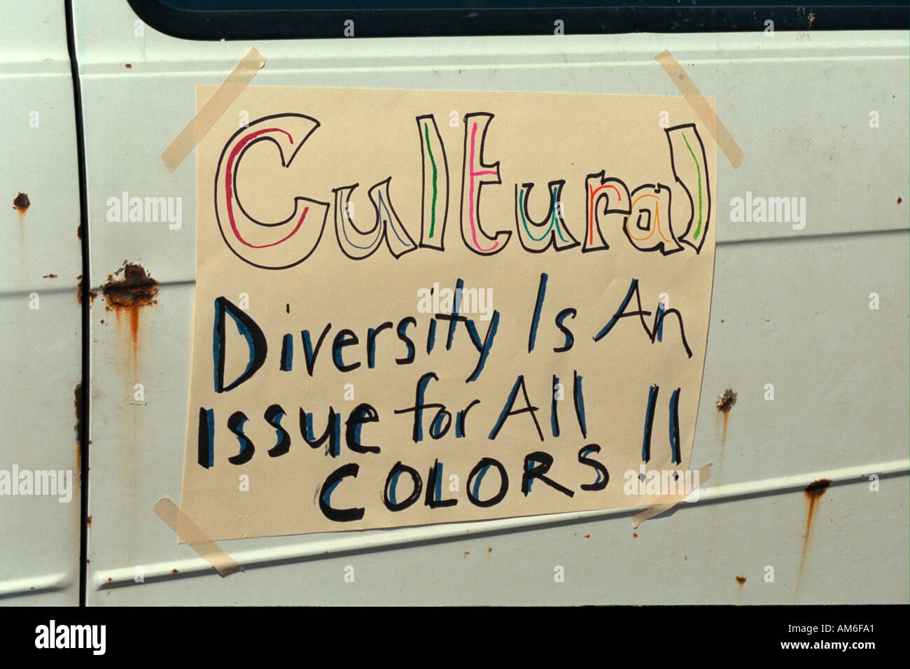 Cultural diversity sign on car in Asian American Festival parade. St ...