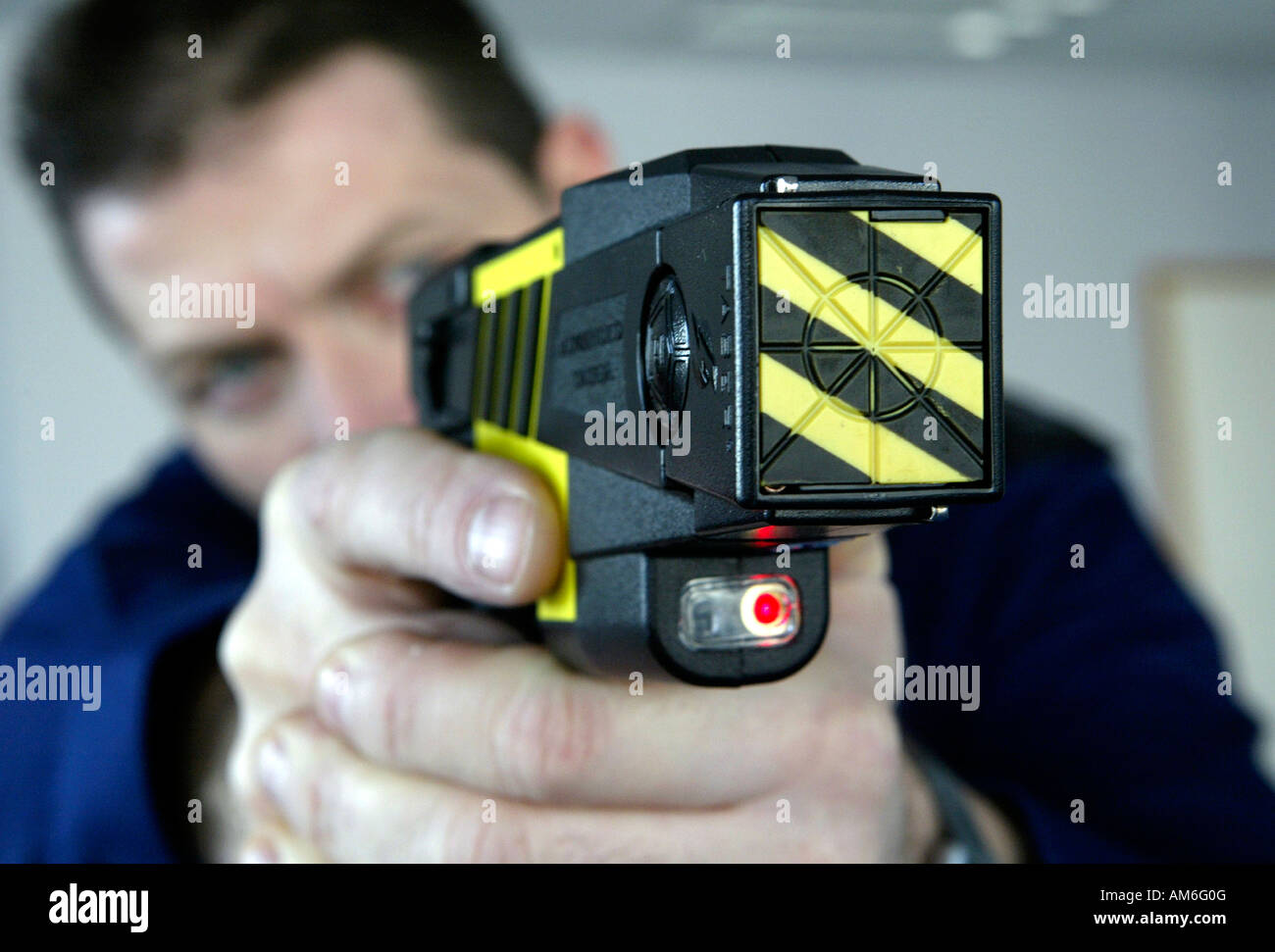 Taser gun and electricity hi-res stock photography and images - Alamy