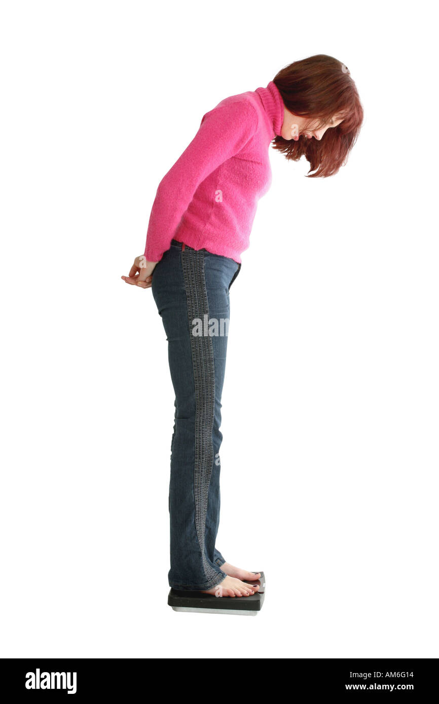 Woman weigh scales shock hi-res stock photography and images - Alamy