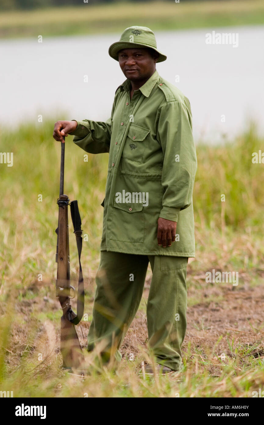 Game guard with rifle in Tanzania Stock Photo - Alamy