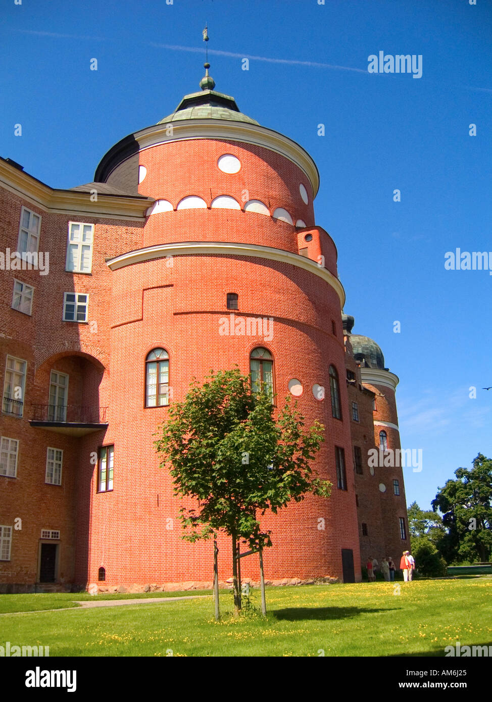 Round towered GRIPSHOLMS SLOTT castle by Lake Mälaren in idyllic ...