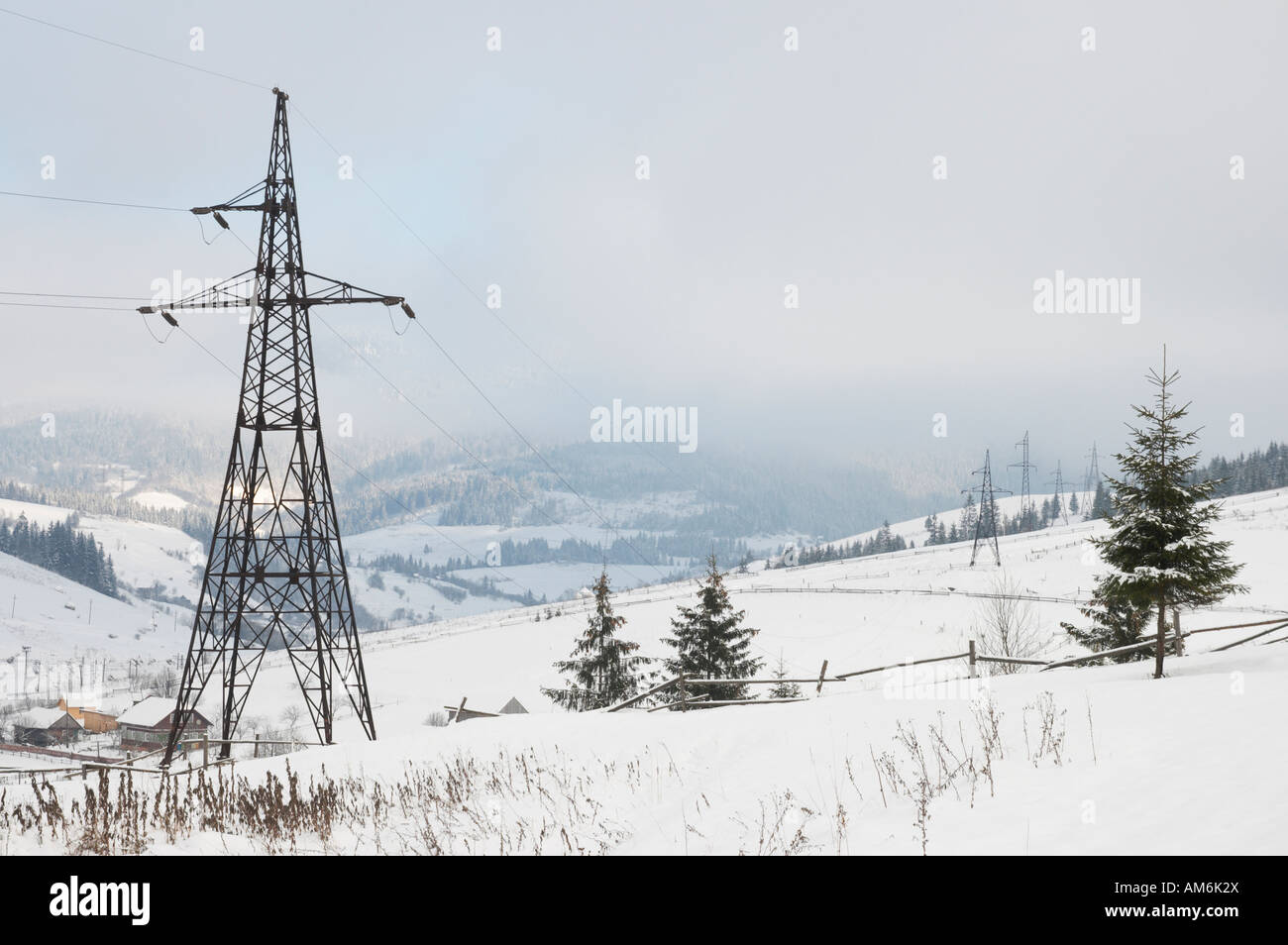 winter mountain landscape with high voltage current line Stock Photo ...