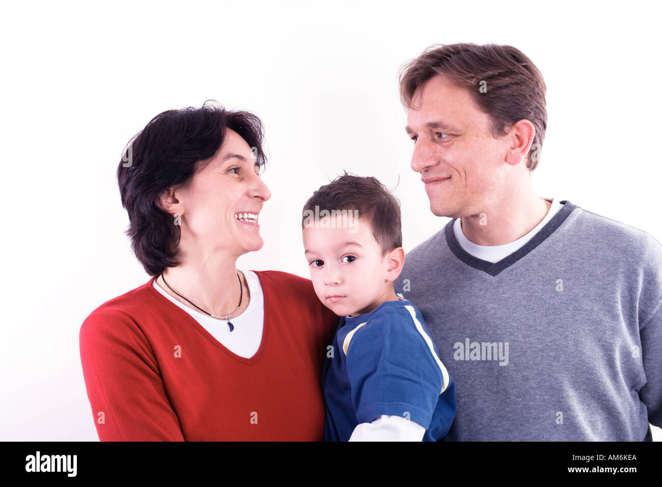 Happy family: Parents with their son Stock Photo - Alamy