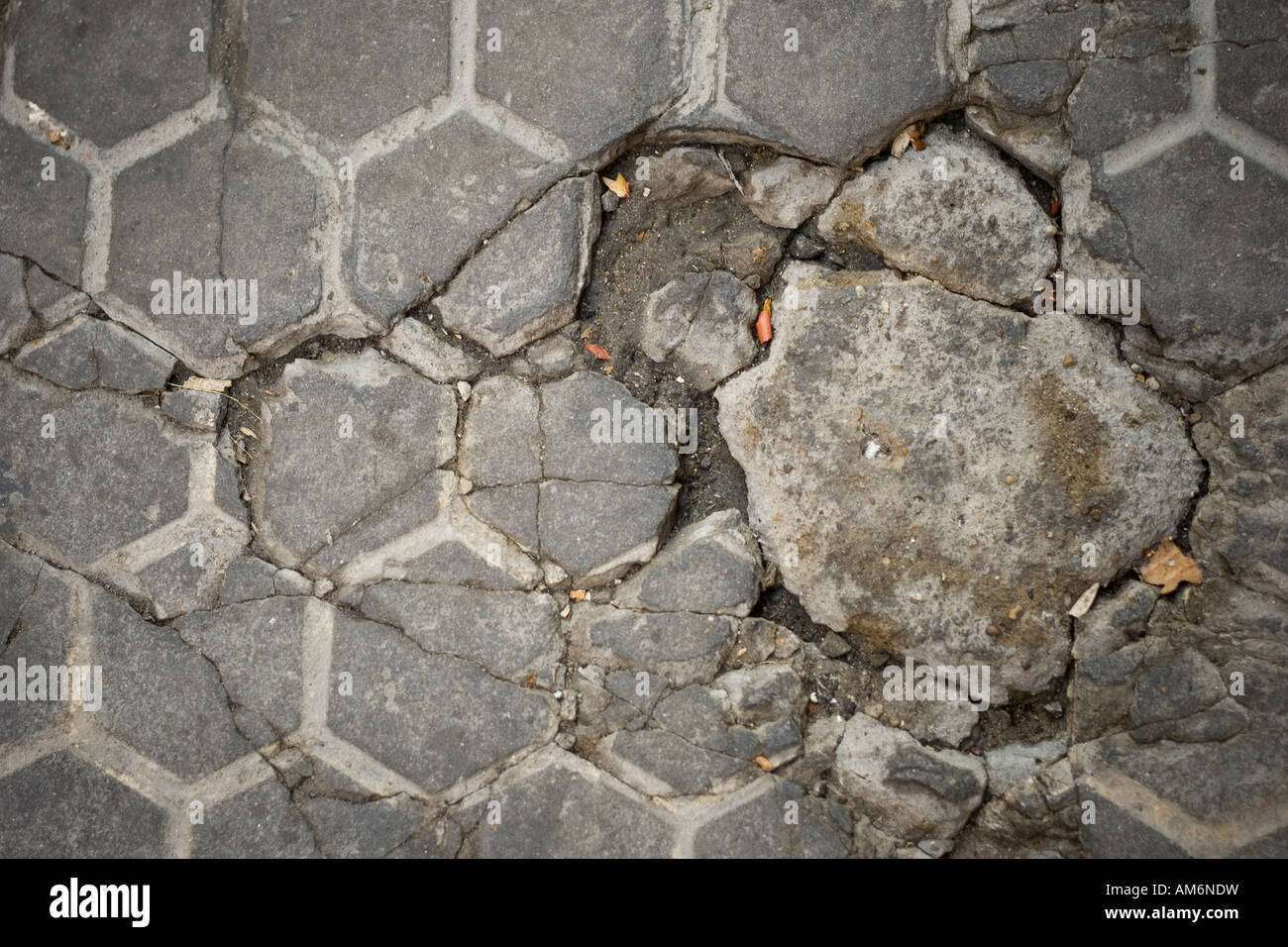 Damaged pavement background Stock Photo - Alamy