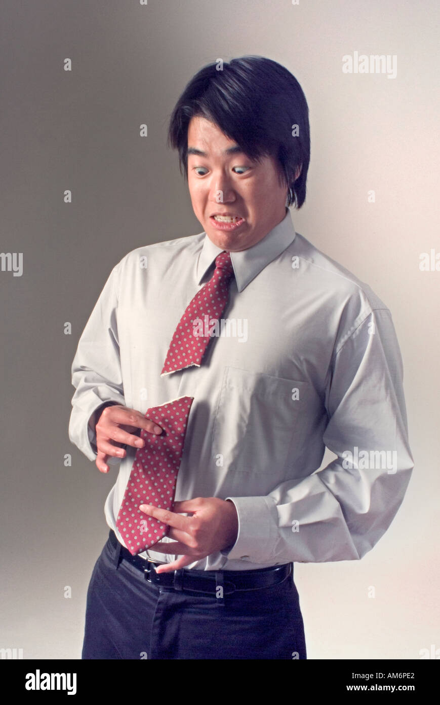 Surprised shocked businessman holding hi-res stock photography and ...