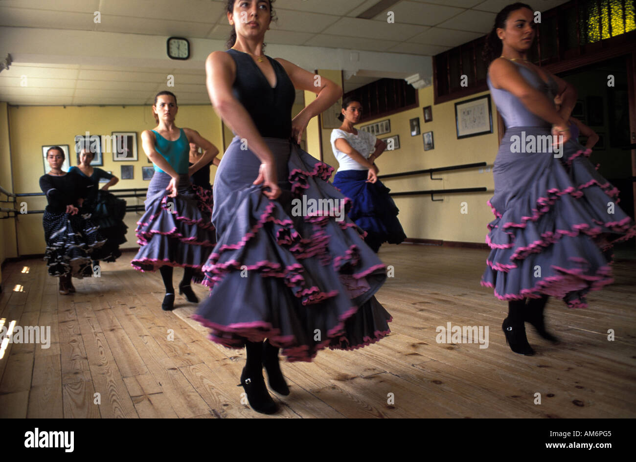 Sevilla young women preparing for their final exams in flamenco dancing ...