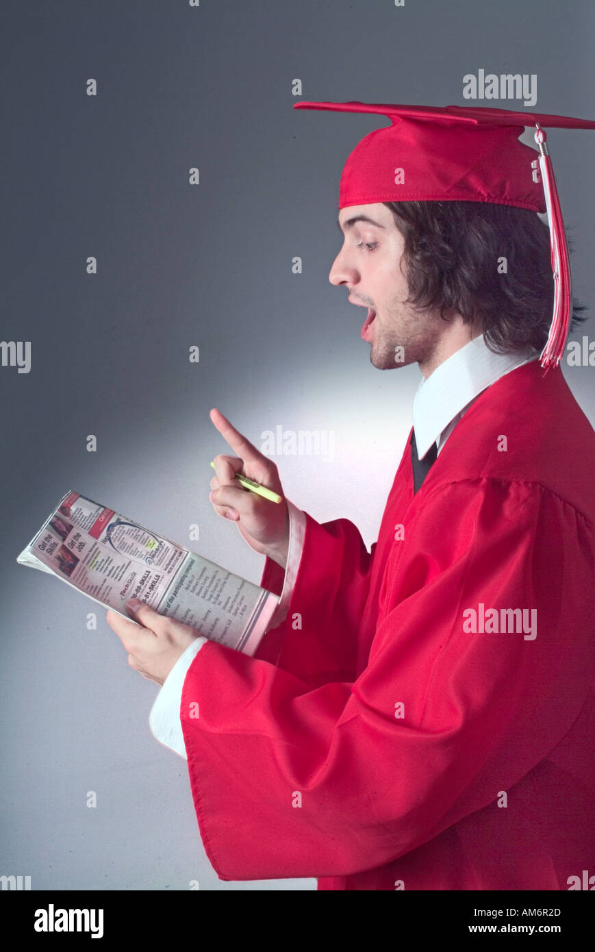 Man in robe reading newspaper hi-res stock photography and images - Alamy