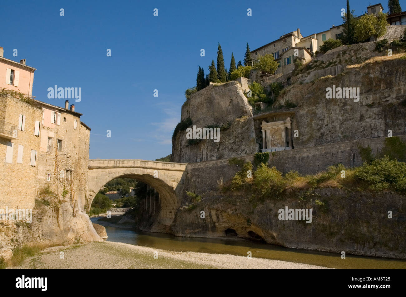 The Roman Bridge Vaison La Romaine and the medieval old town Provence ...