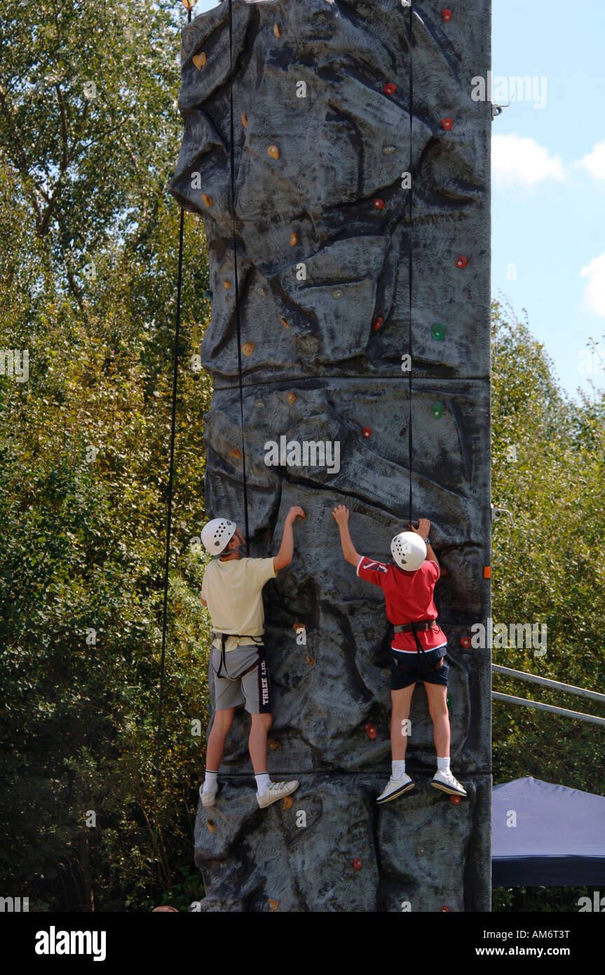Two boys climbing rock hi-res stock photography and images - Alamy