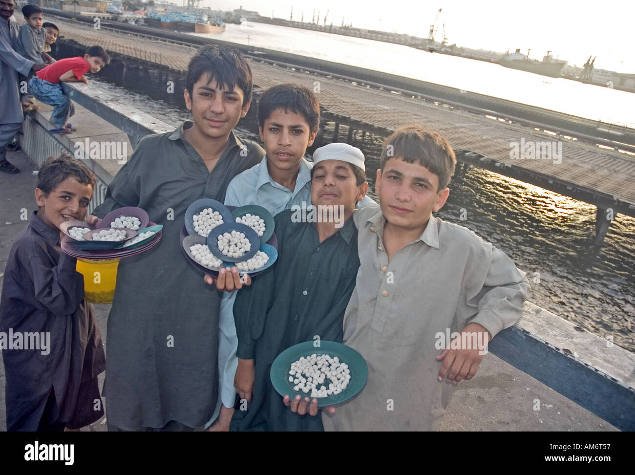 Pakistani kids selling sweets near Karachi harbour, Pakistan Stock ...