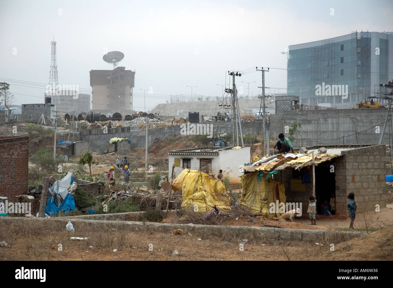 The Cybergateway building rising in the background of Hyderabad s slums ...