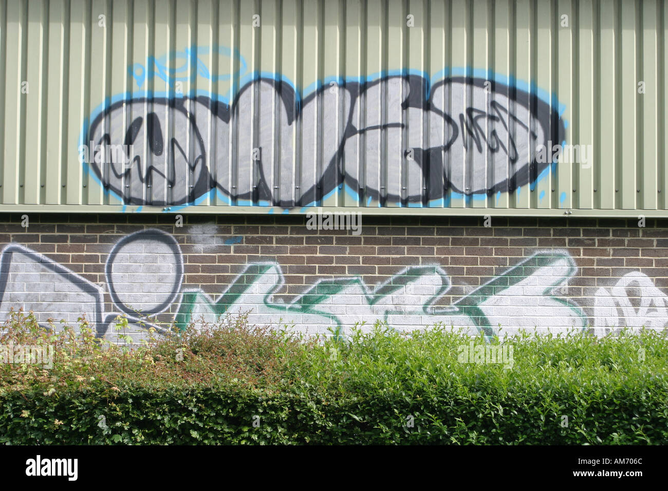 The graffiti covered side of a warehouse on an industrial estate in ...