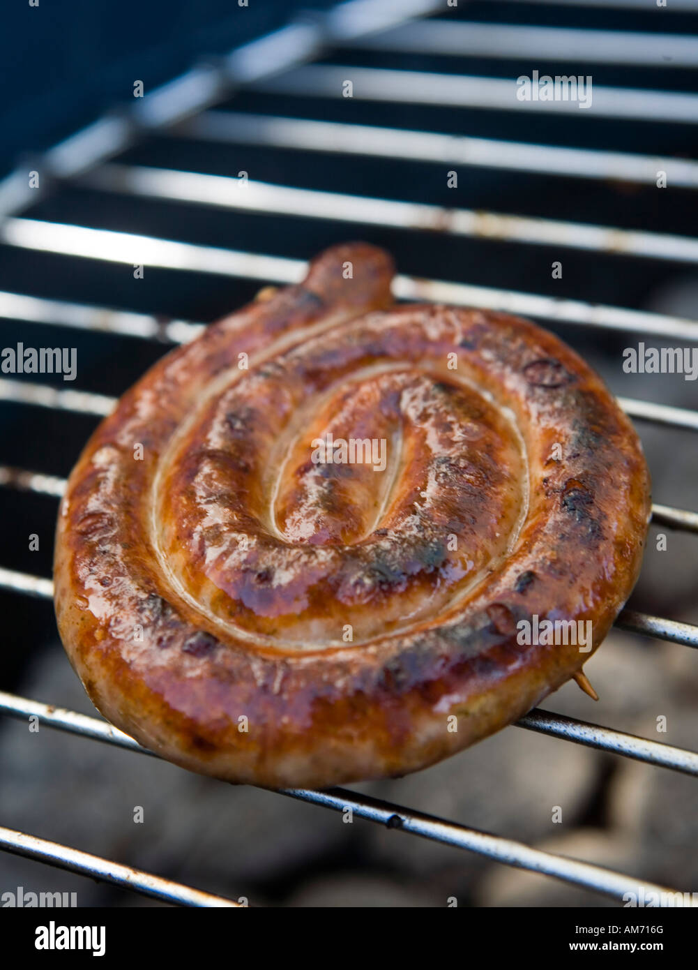 Barbecue food: snail sausage Stock Photo - Alamy