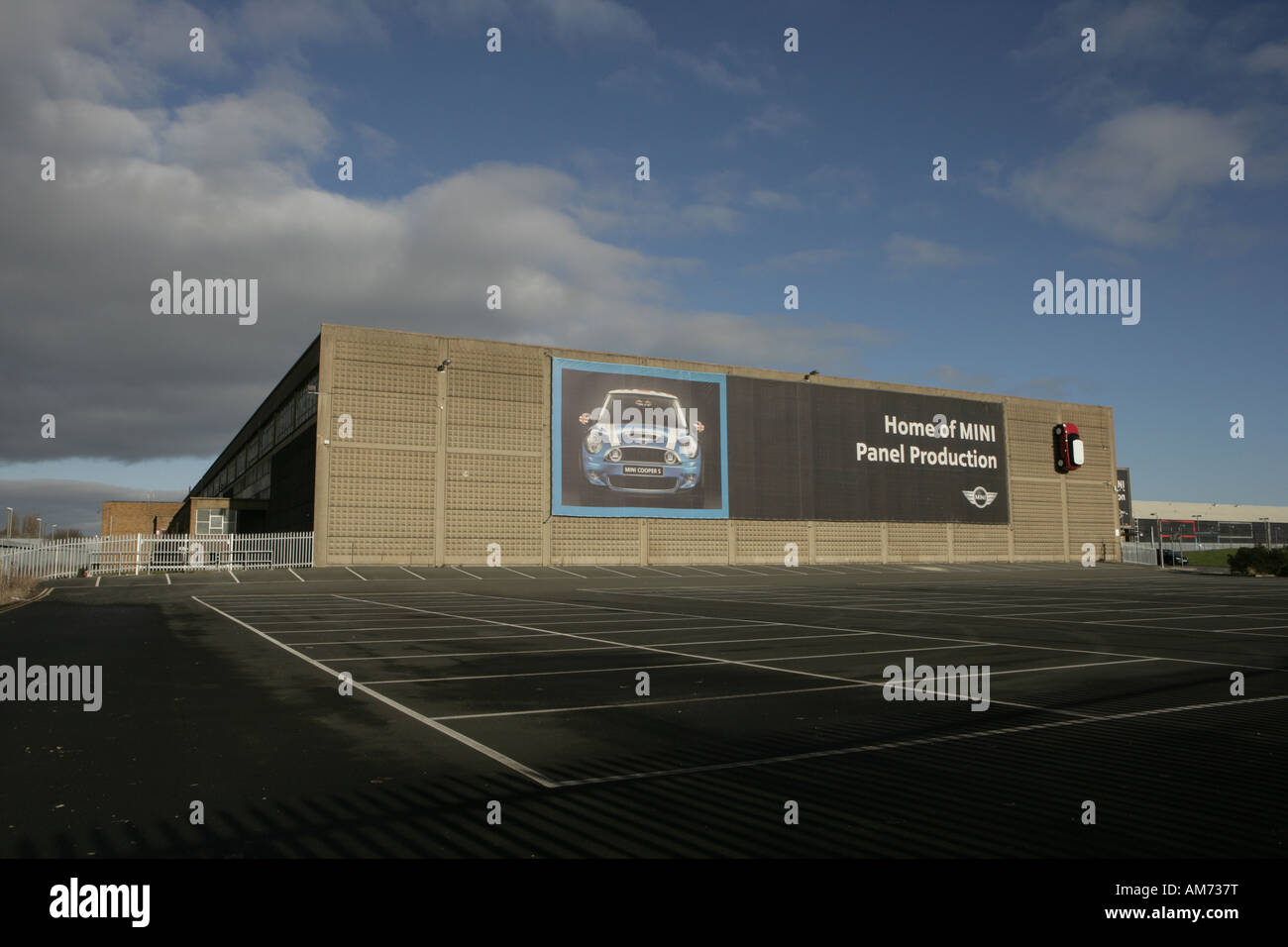 A BMW Mini car on the outside wall of the factory in Swindon that make ...