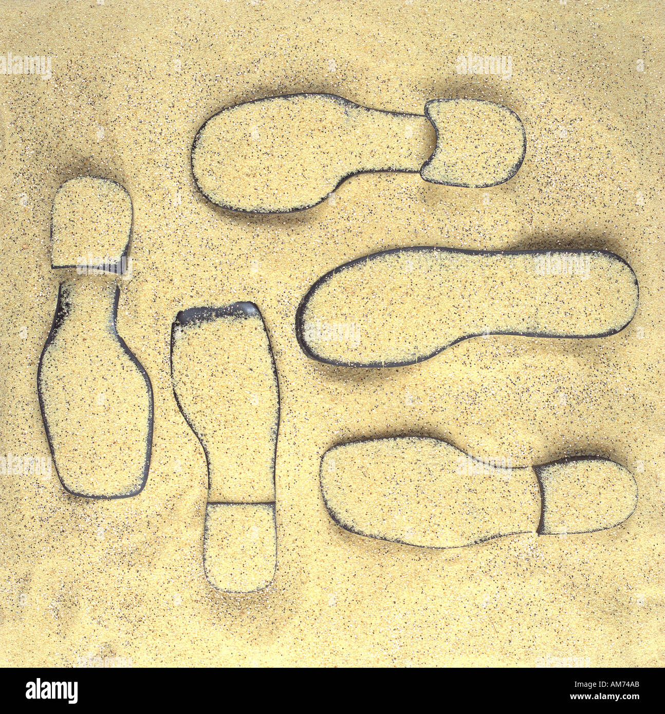 shoes in sand Stock Photo - Alamy
