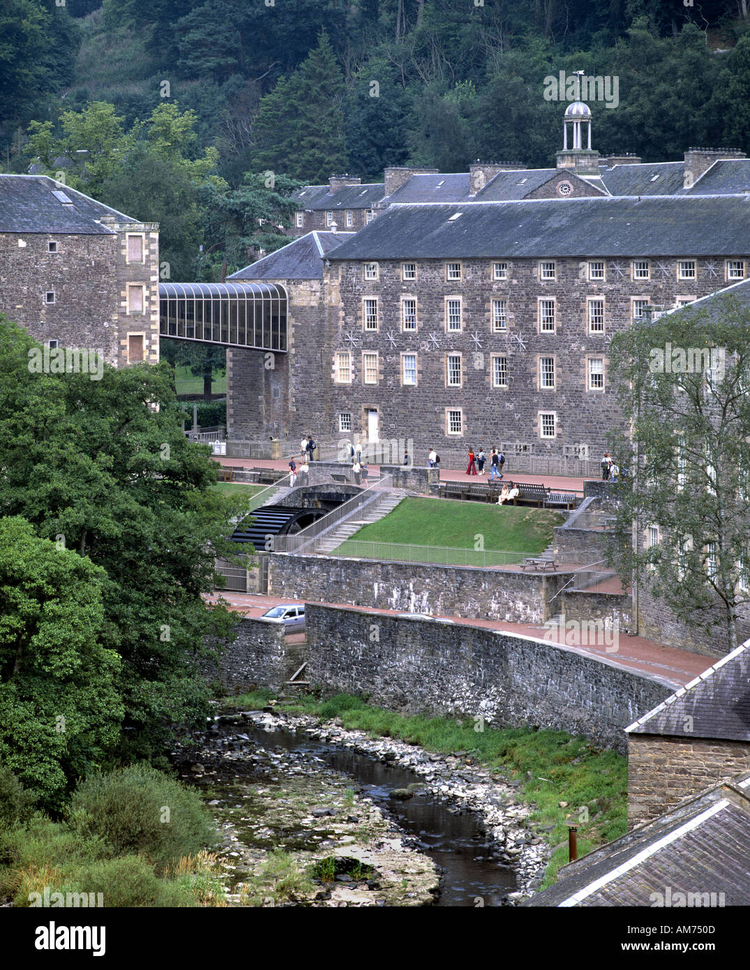 A restored water wheel at the New Lanark Mills, Strathclyde, Scotland ...
