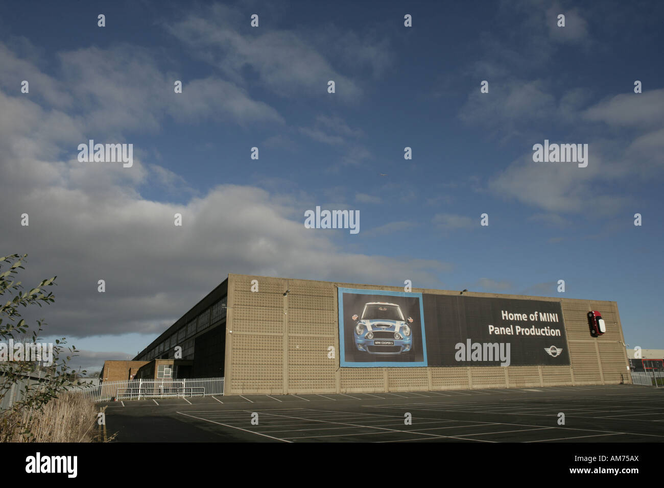 A BMW Mini car on the outside wall of the factory in Swindon that make ...