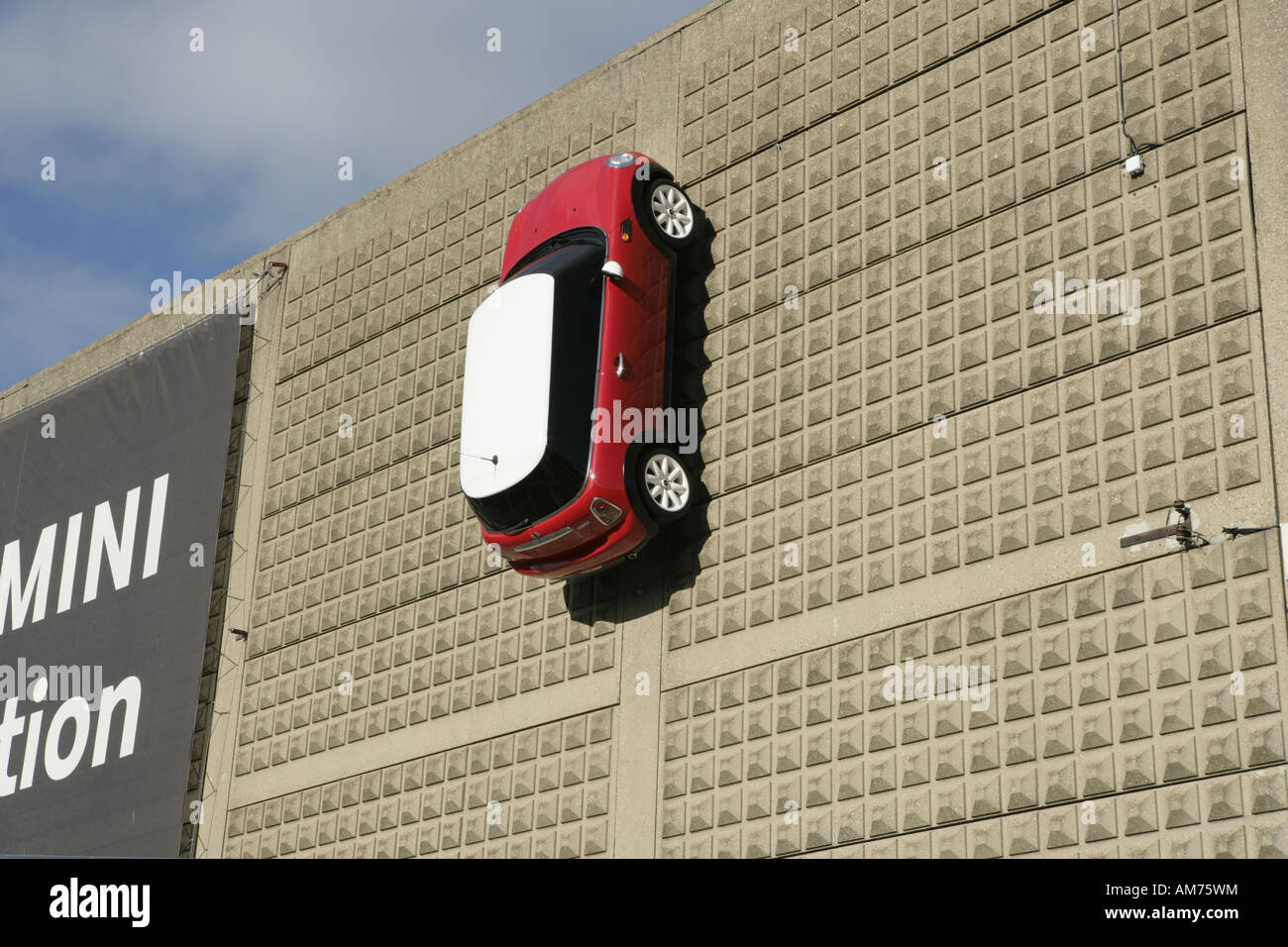 A BMW Mini car on the outside wall of the factory in Swindon that make ...