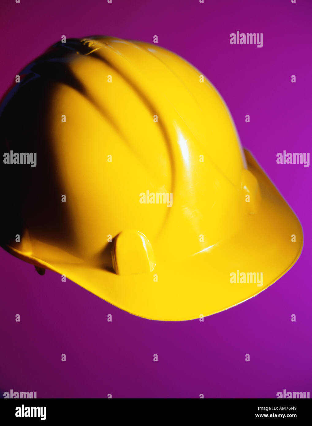 A yellow hard hat Stock Photo - Alamy