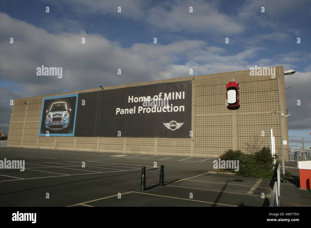 A BMW Mini car on the outside wall of the factory in Swindon that make ...