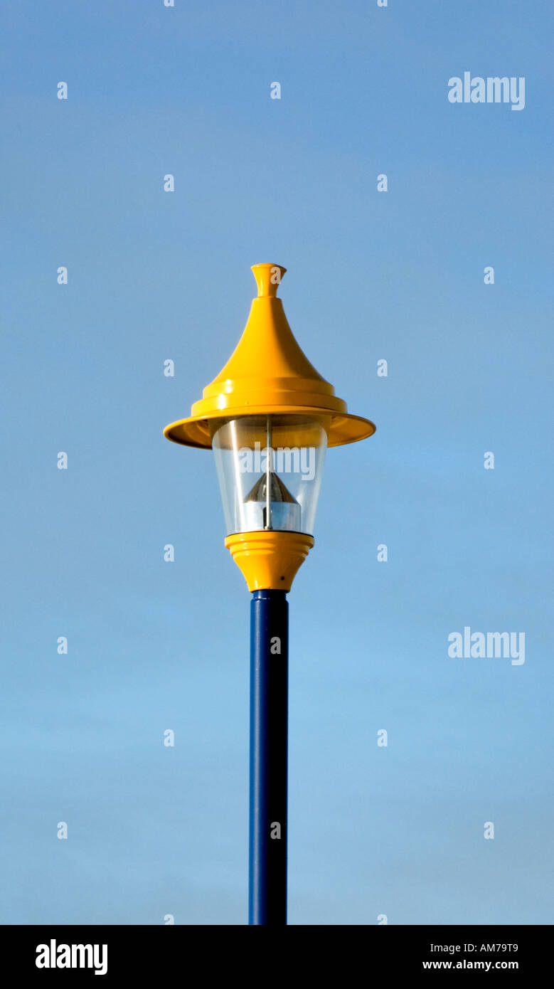 Vivid blue and yellow lamp Stock Photo - Alamy