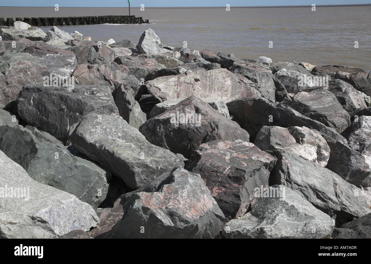 Rock armour Cobbolds Point, Felixstowe, Suffolk, England Stock Photo ...