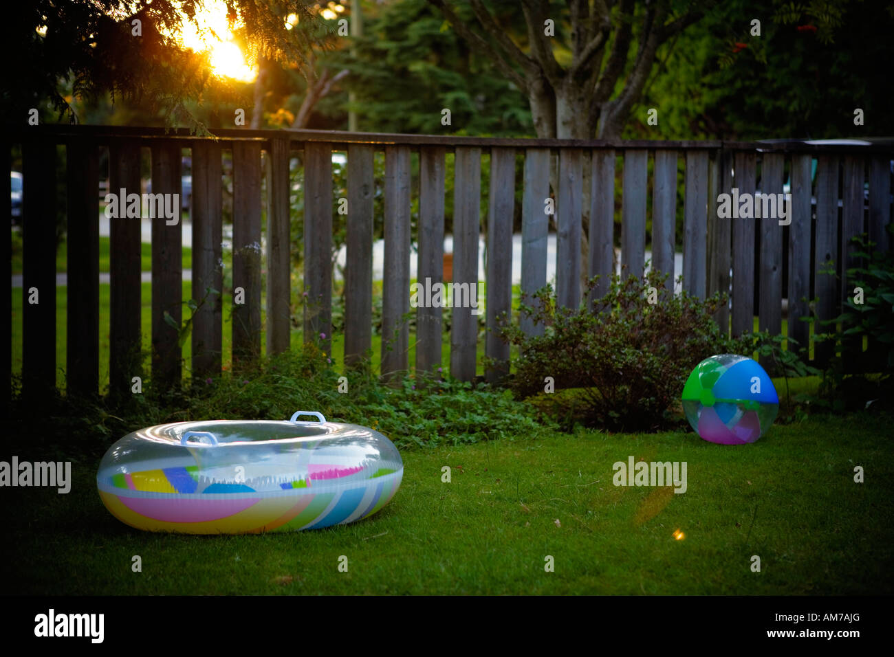 inflatable beach toys in a yard Stock Photo - Alamy