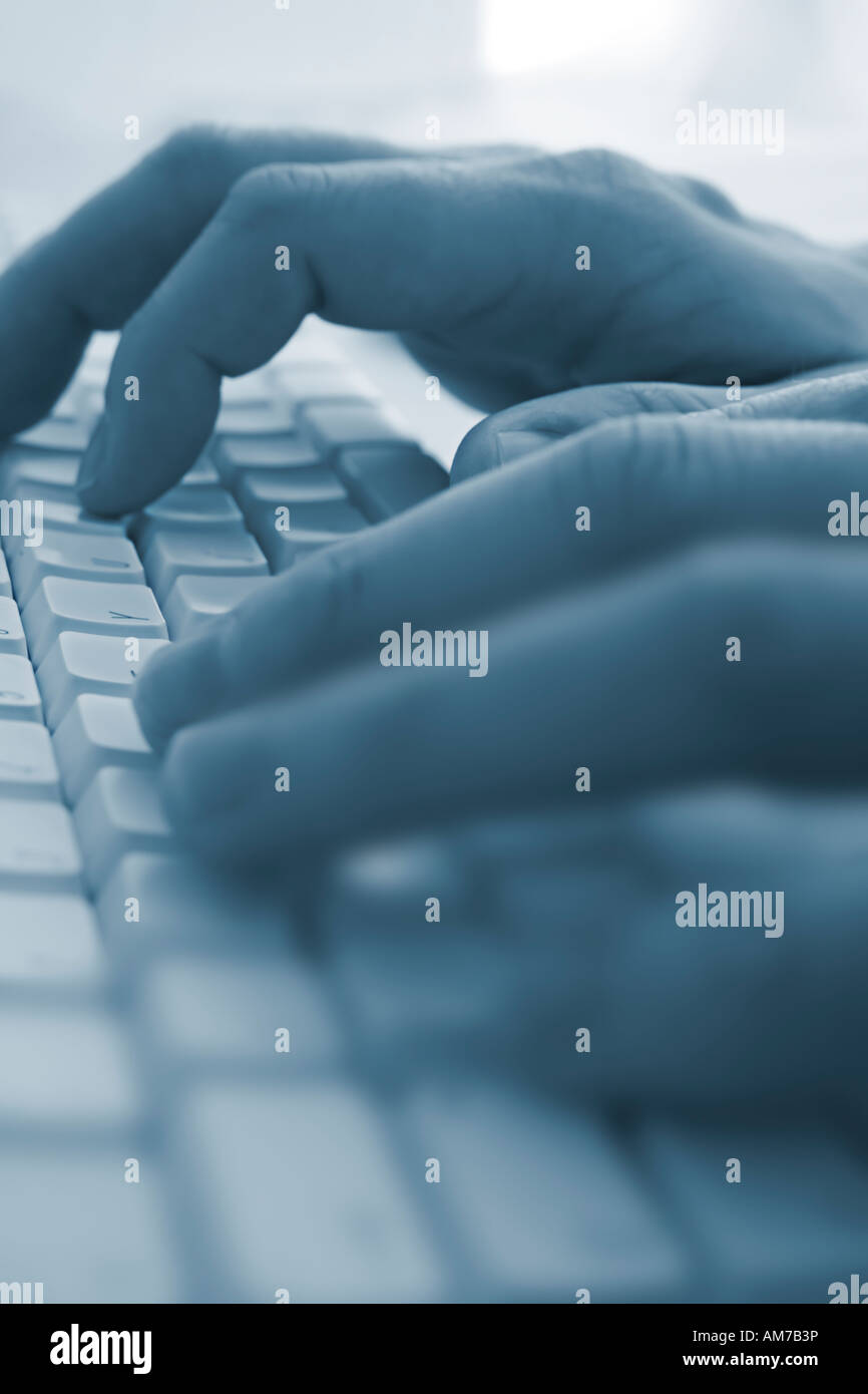 Male Hands Typing at a Keyboard with focus on Centre of Keyboard Stock ...