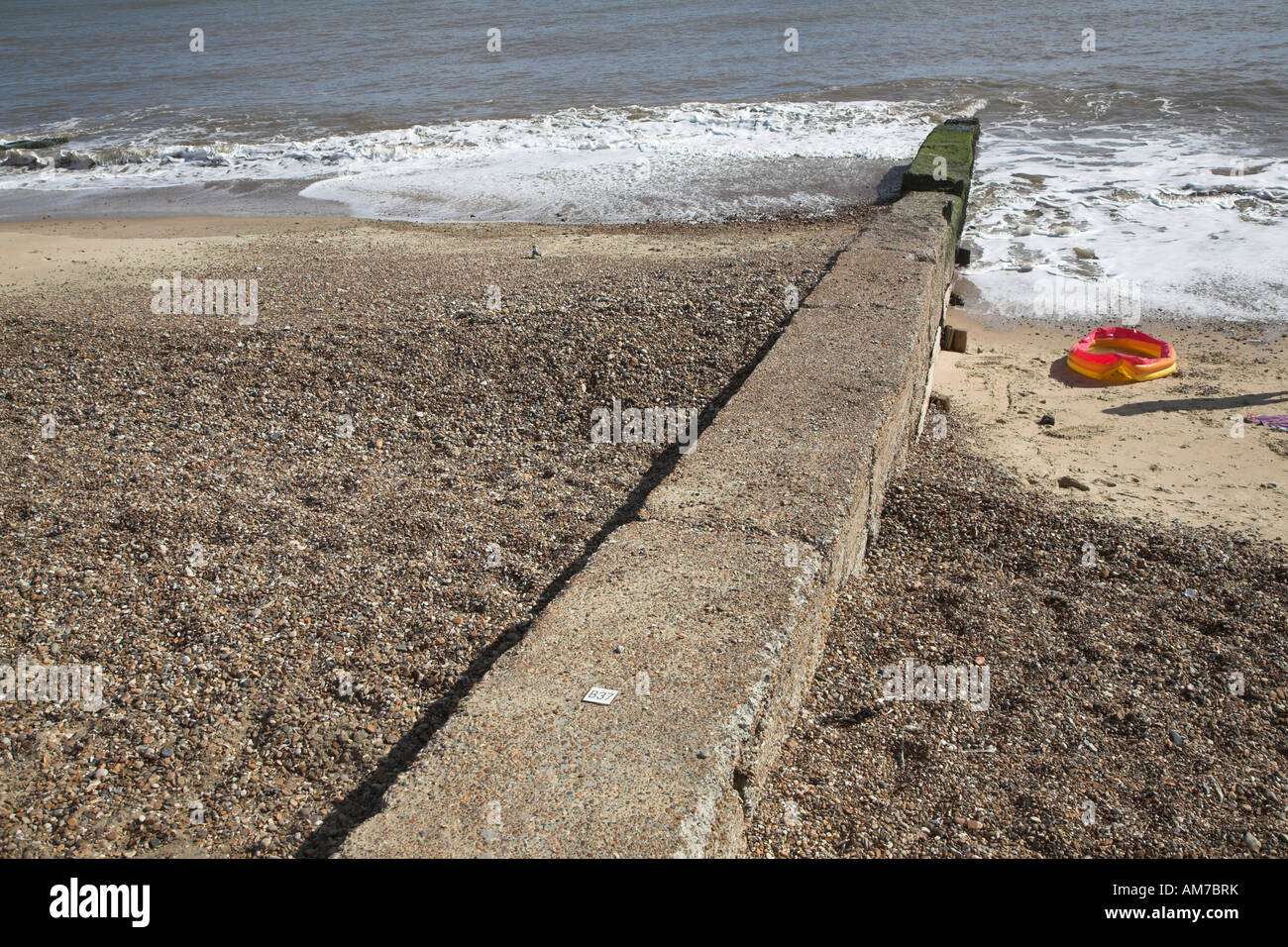 Concrete groyne Felixstowe, Suffolk, England showing different beach ...