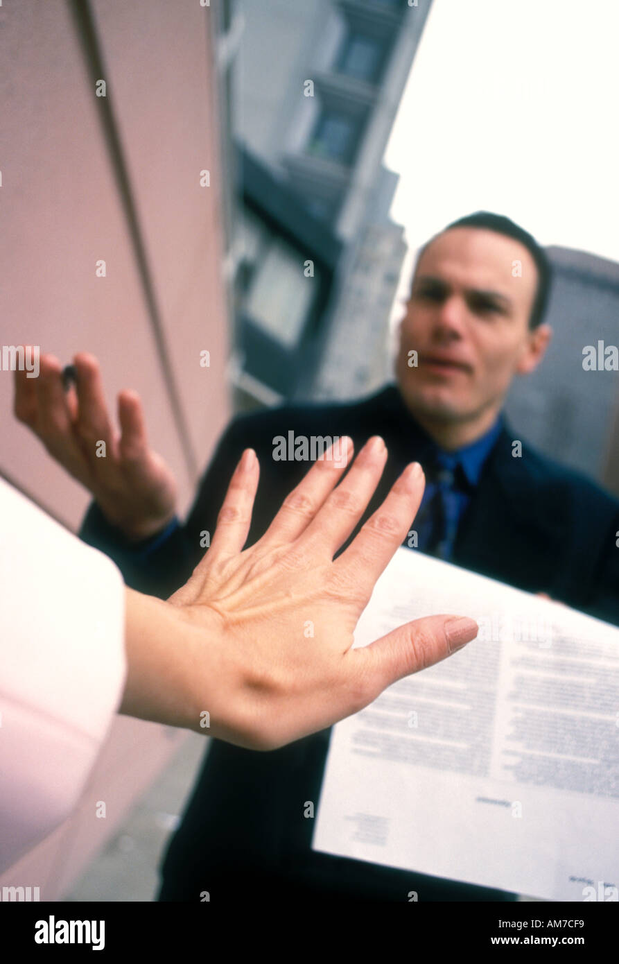 Refusing to sign a contract Stock Photo - Alamy