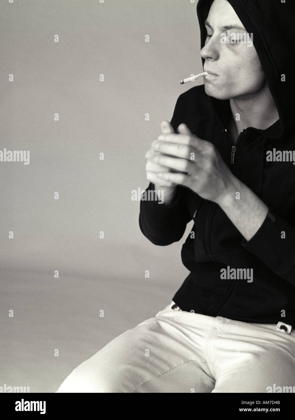 Male smoker showing signs of ill health Stock Photo - Alamy