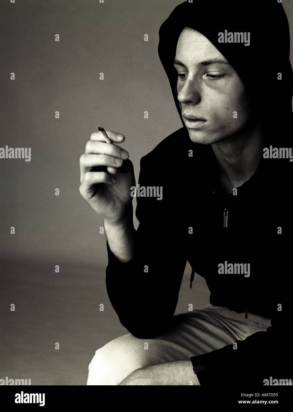 Male smoker showing signs of ill health Stock Photo - Alamy