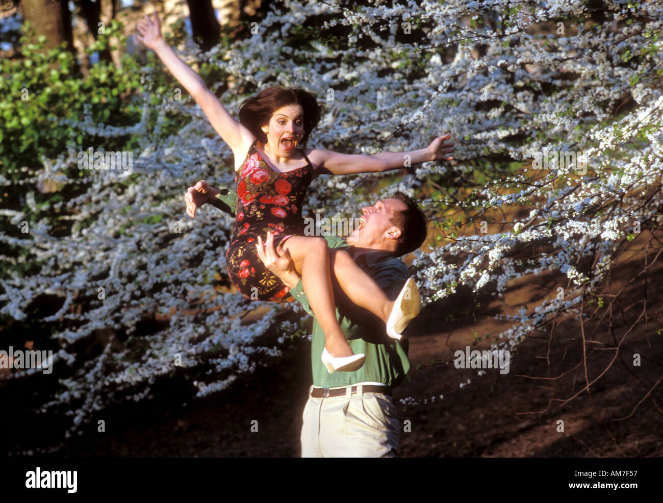 Young woman throwing heart hi-res stock photography and images - Alamy