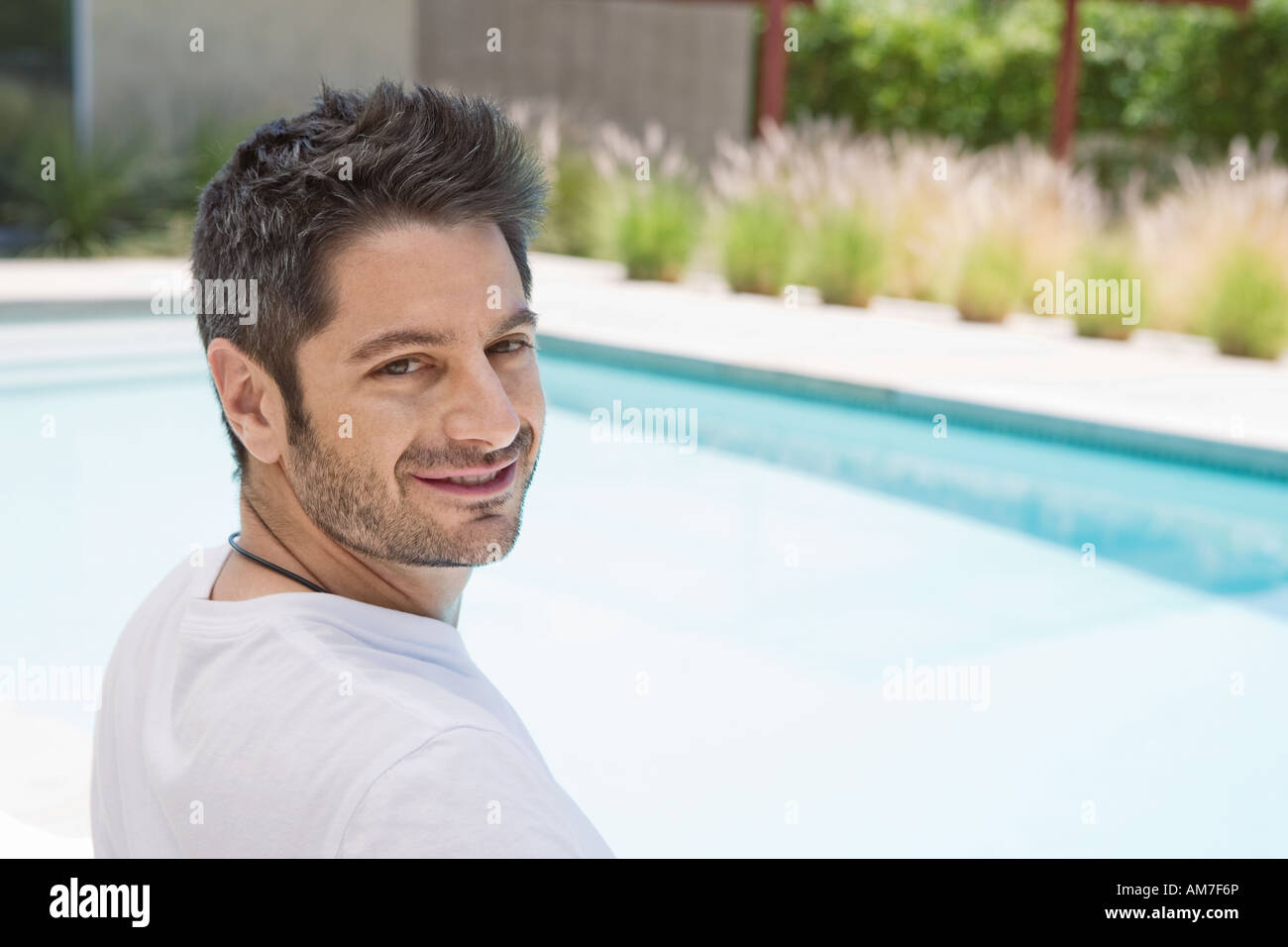 Men sitting near pool hi-res stock photography and images - Alamy