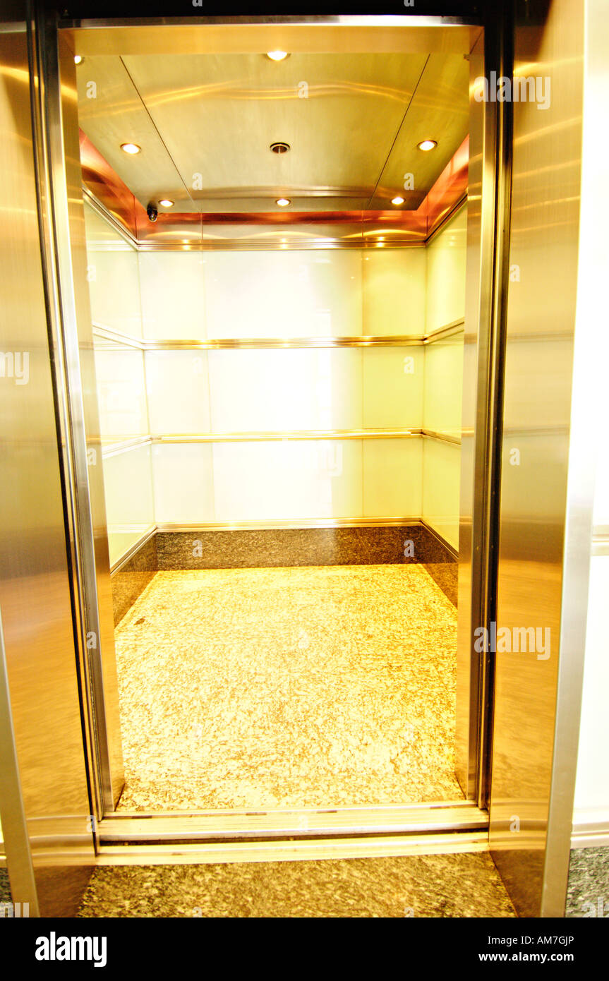 Illuminated vacant elevator Stock Photo - Alamy