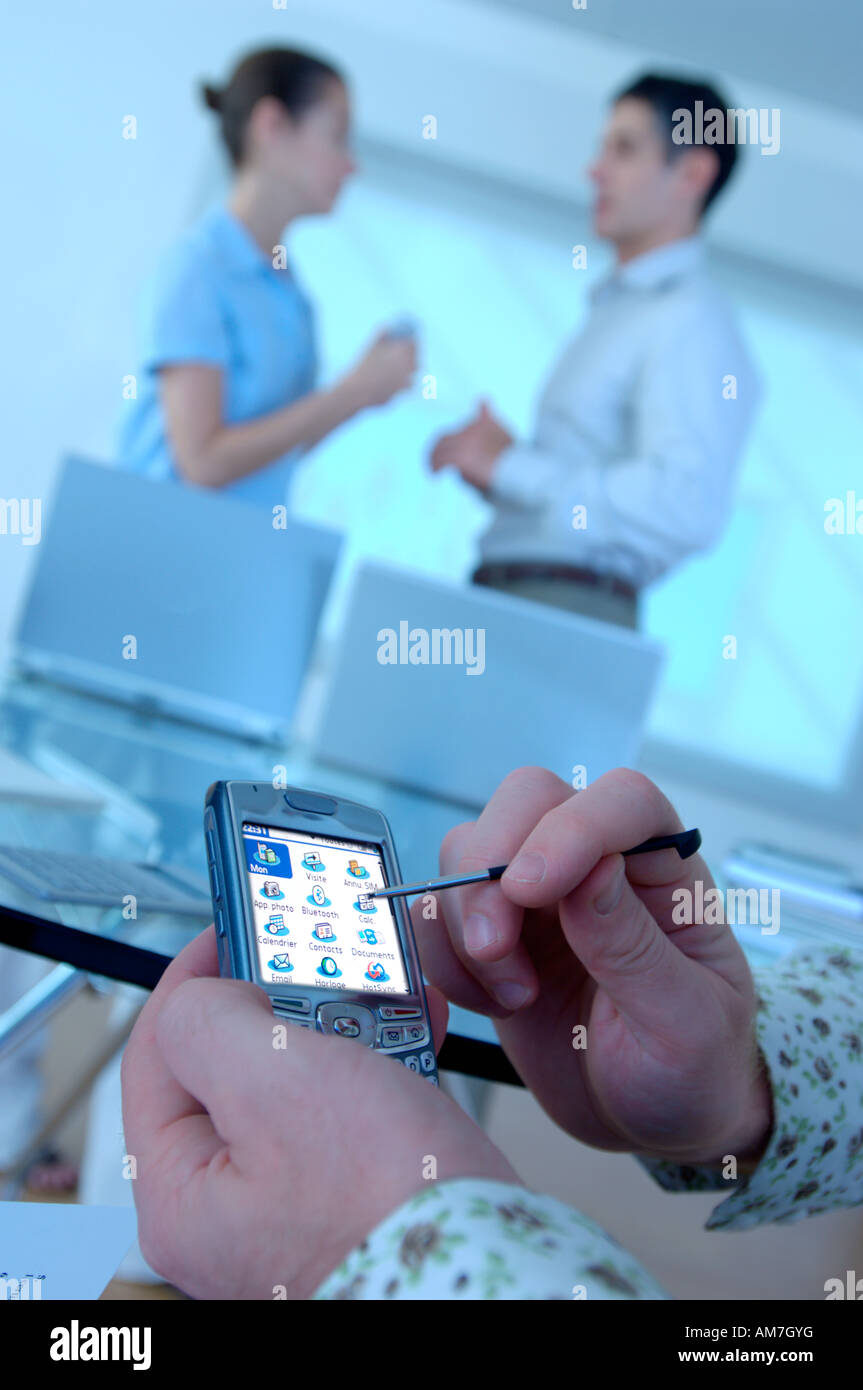 Man operating mobile phone Stock Photo - Alamy