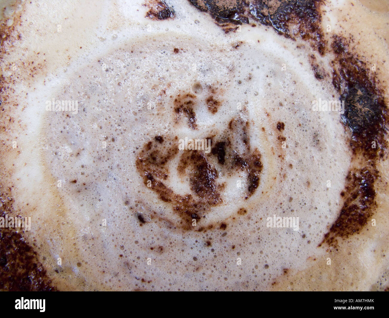 closeup colour image off looking down at the top of a cup off coffee ...