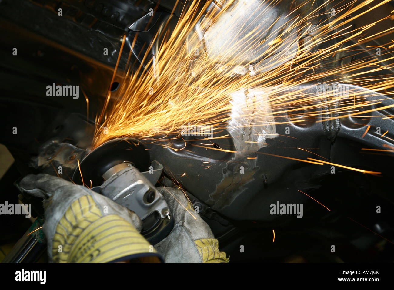 Man works grinder hi-res stock photography and images - Alamy