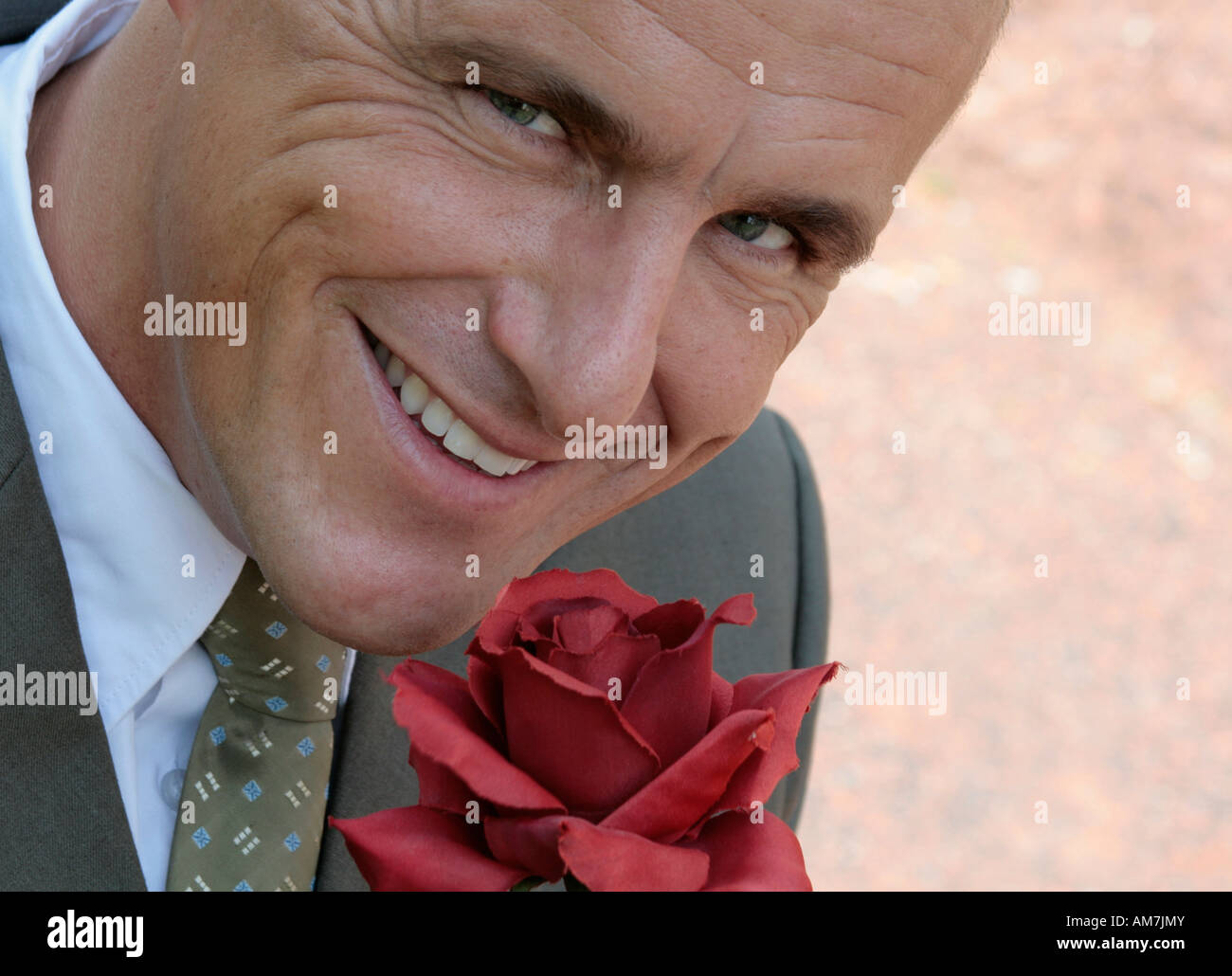Man with rose Stock Photo - Alamy