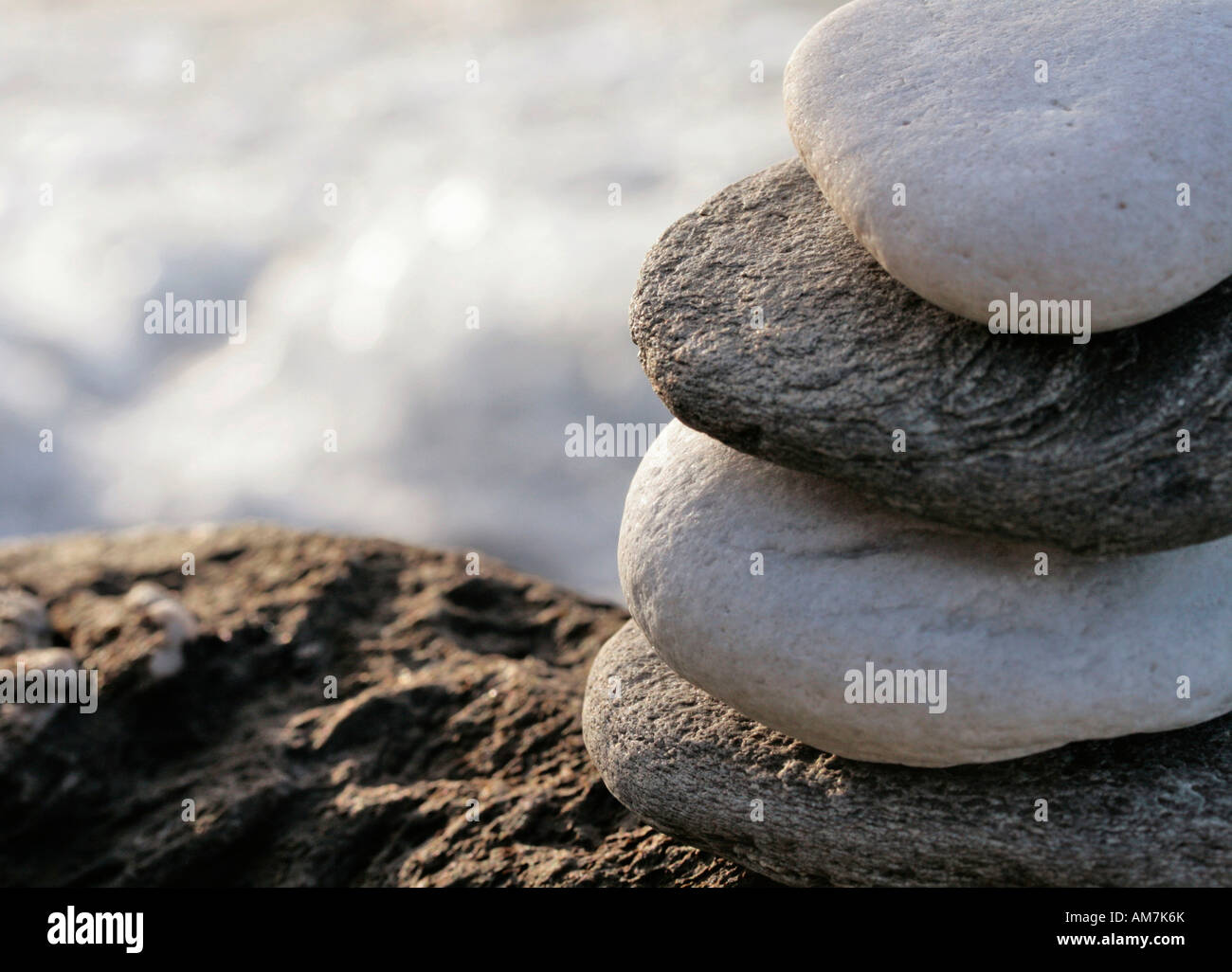Arrangement of stones at the sea Stock Photo - Alamy
