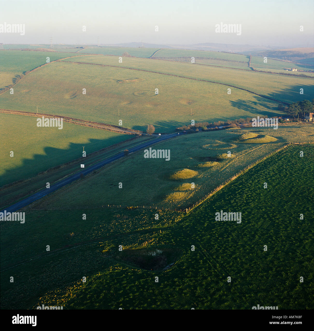 Bronze Age Poor Lot Barrows at dusk Dorset UK aerial view Stock Photo ...