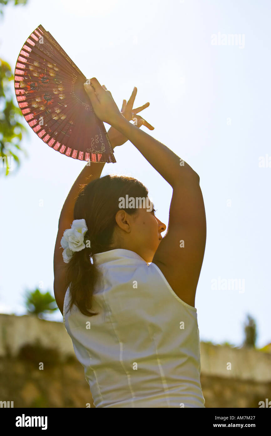Young Spanish female dancer with Spanish fan Stock Photo - Alamy