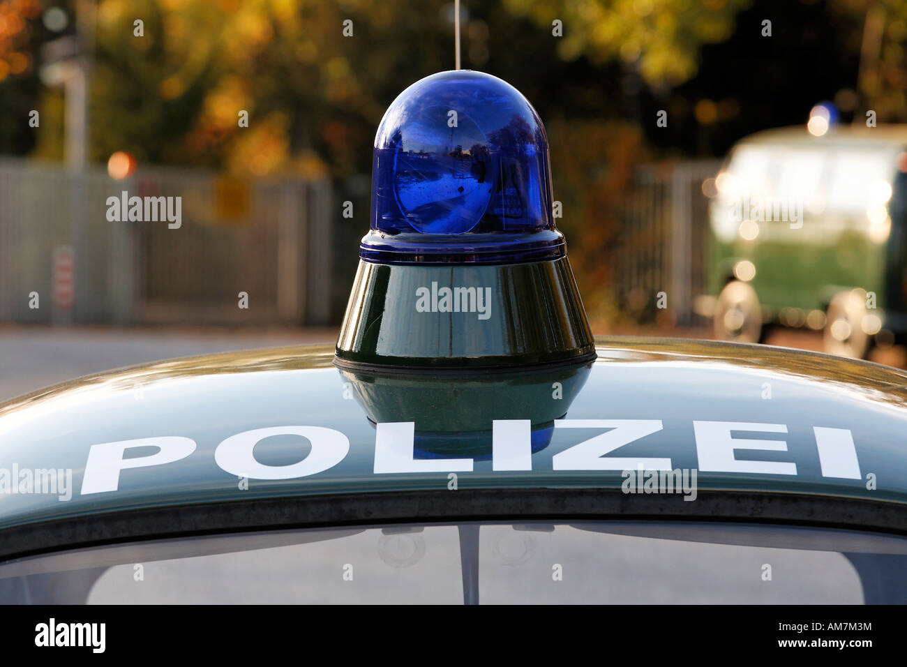 Flashing light and lettering at a historic patrol car of the German ...